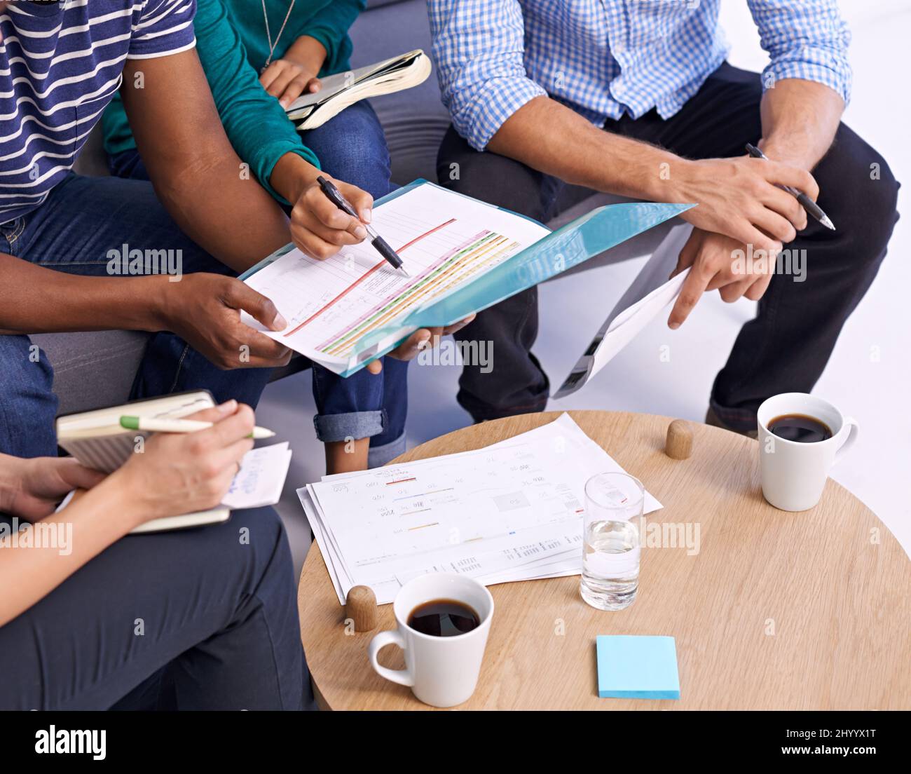 The best ideas are caffeine driven. Cropped shot of a group of ...