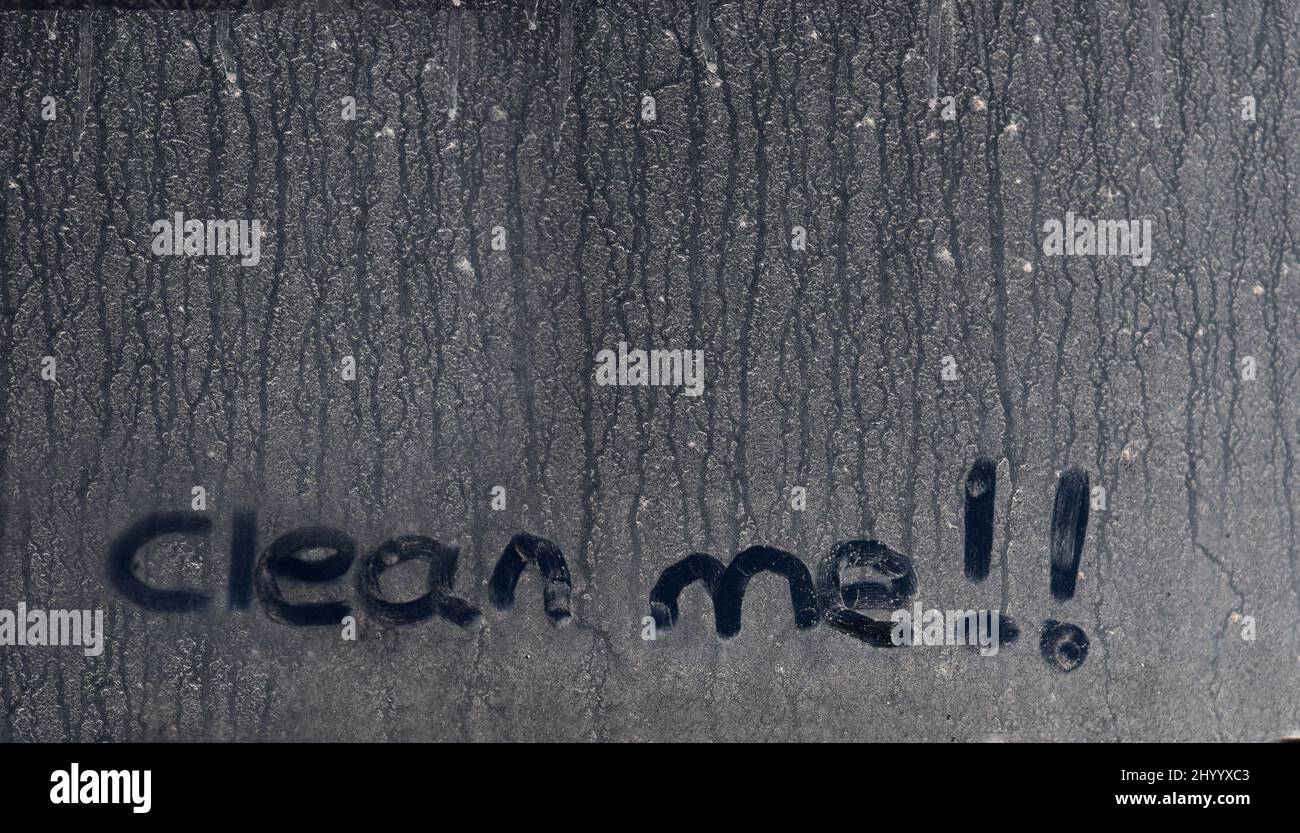 "Clean me" written on the dirty window of a car parked in Santa Fe, New ...