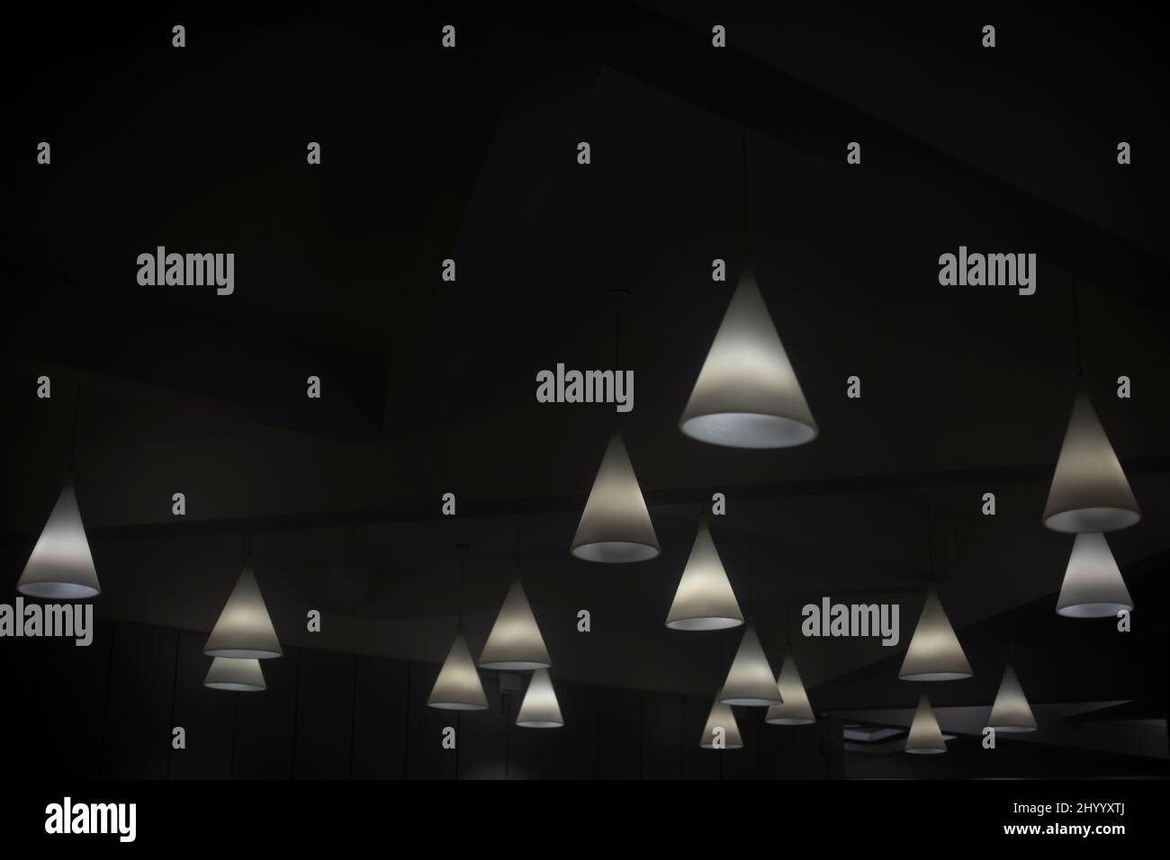 Lots of lamps on ceiling. Interior details. Light sources in room ...