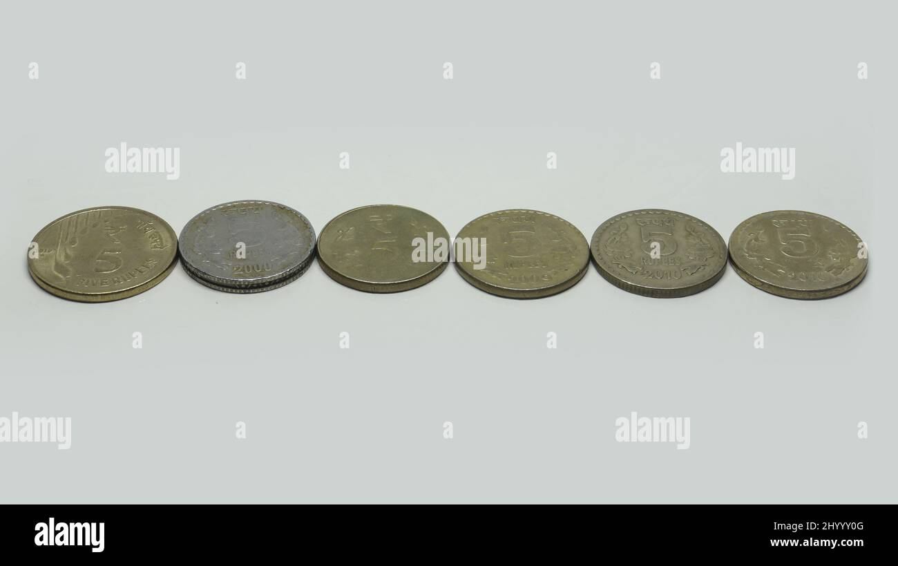 Closeup shot of Indian five rupee different coins isolated on white ...