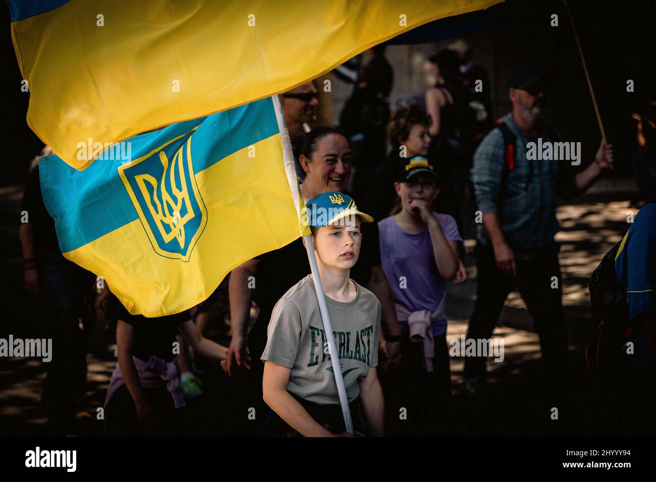 People with flags on the freedom day protest in Melbourne, Australia ...