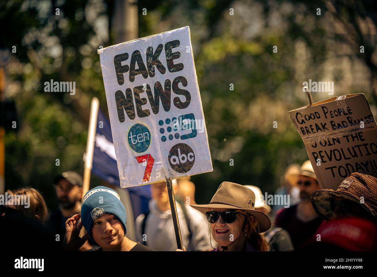 Person holding a fake news banner on the freedom day protest in ...