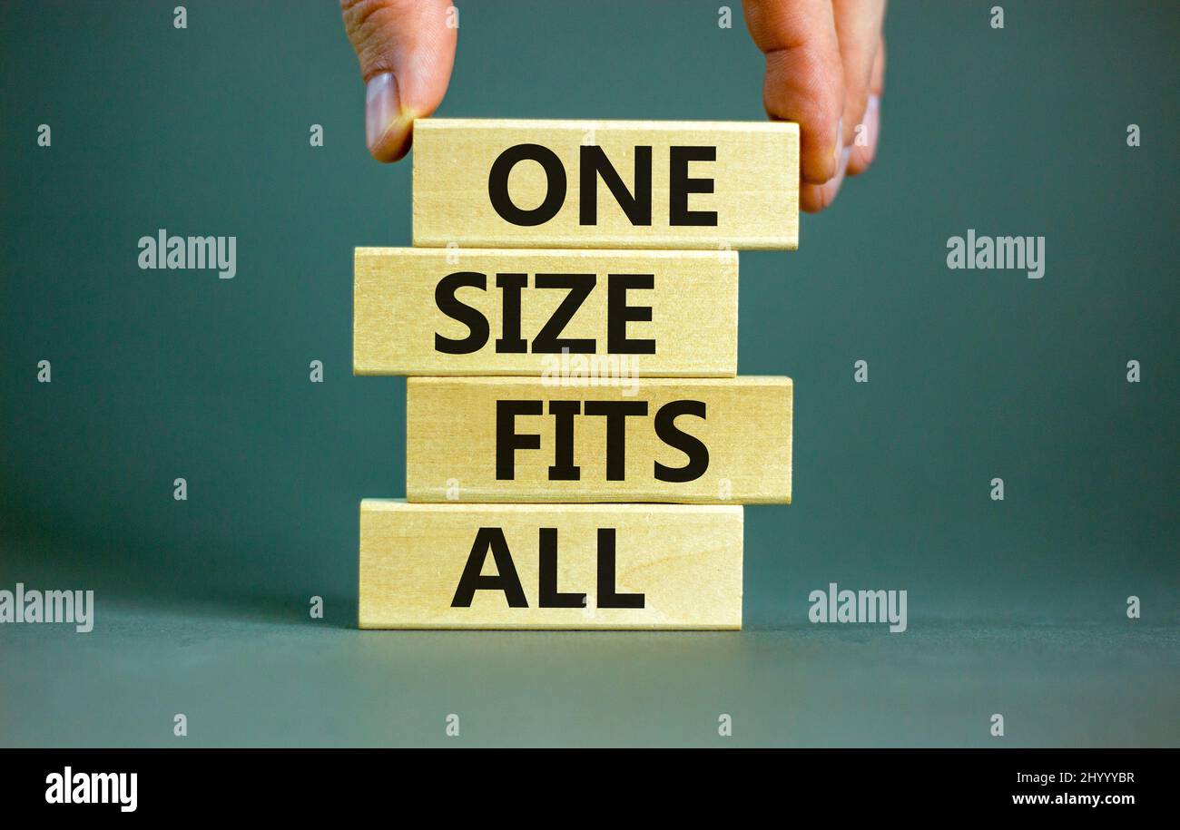 One size fits all symbol. Concept words One size fits all on wooden ...