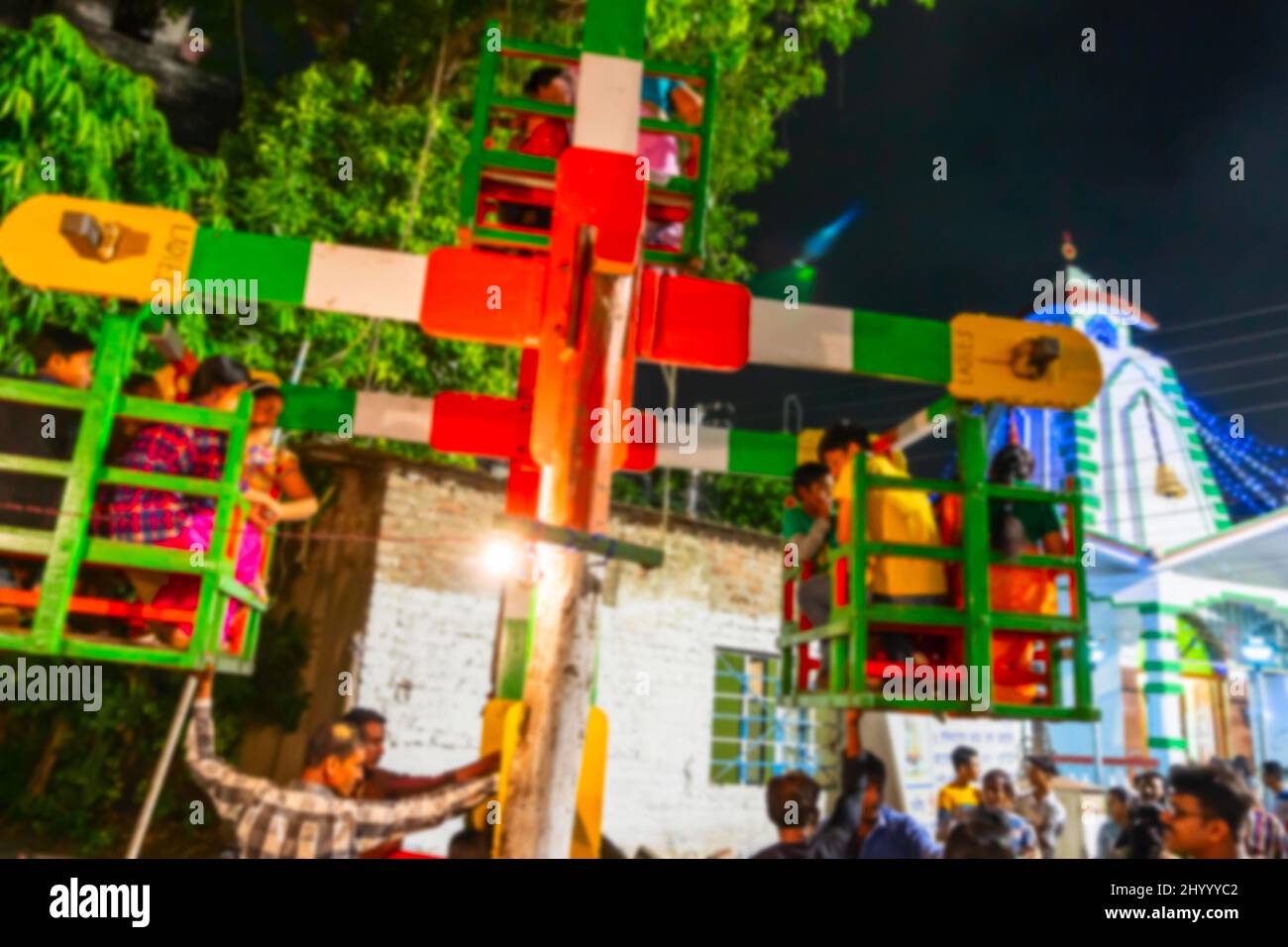 Blurred image of Howrah, West Bengal, India. Children are riding on ...