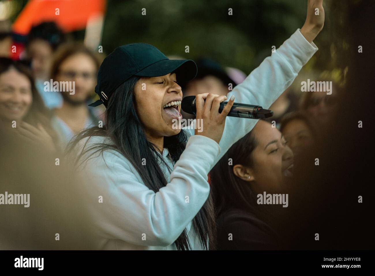 Female giving an emotional speech on the freedom day protest in ...