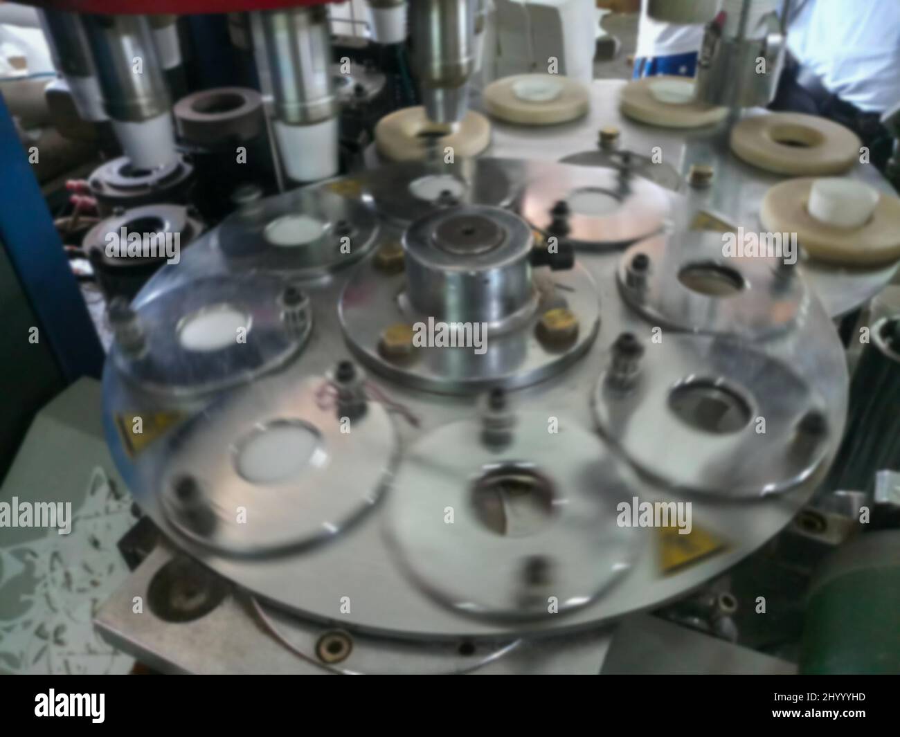 Blurred image of Paper cups are being made from paper, using paper cup ...