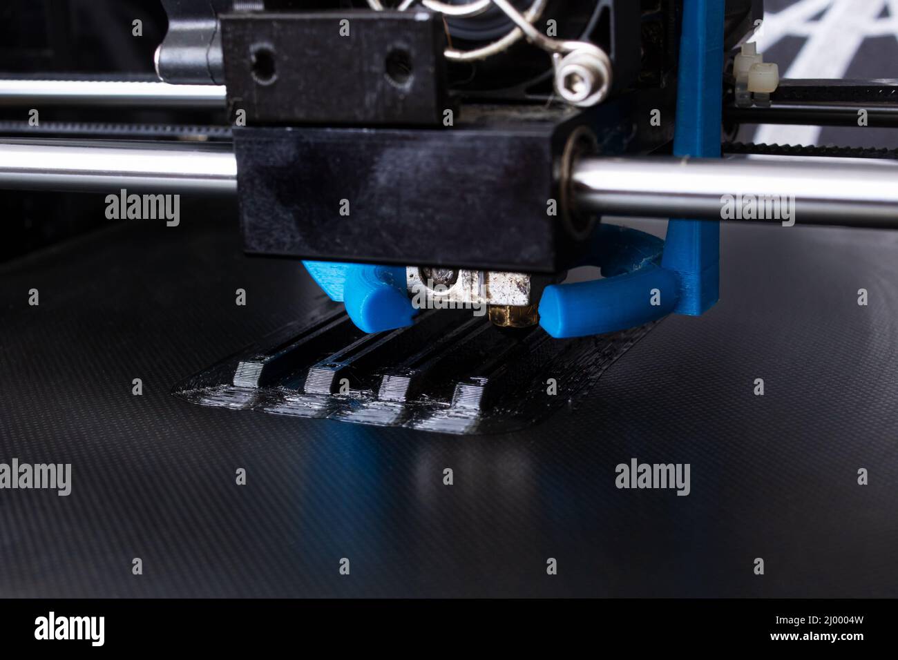 3d printer prints plastic part close up Stock Photo - Alamy