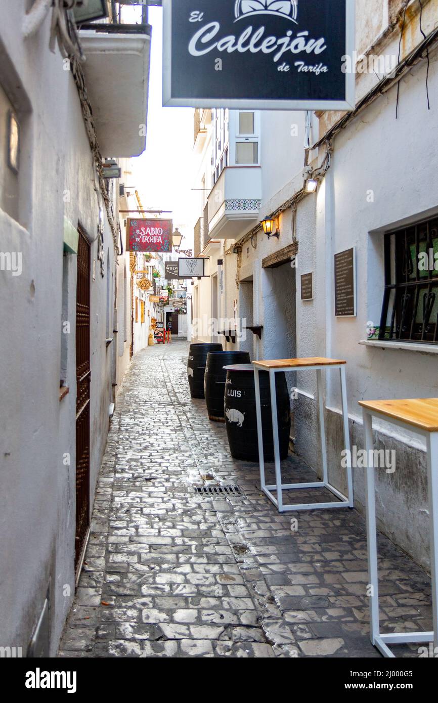 Streets of Tarifa city with old bars. Touristic travel destination in ...