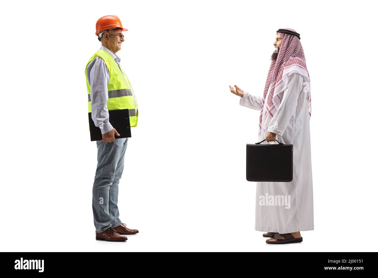 Mature male site engineer and a saudi arab businessman having a ...