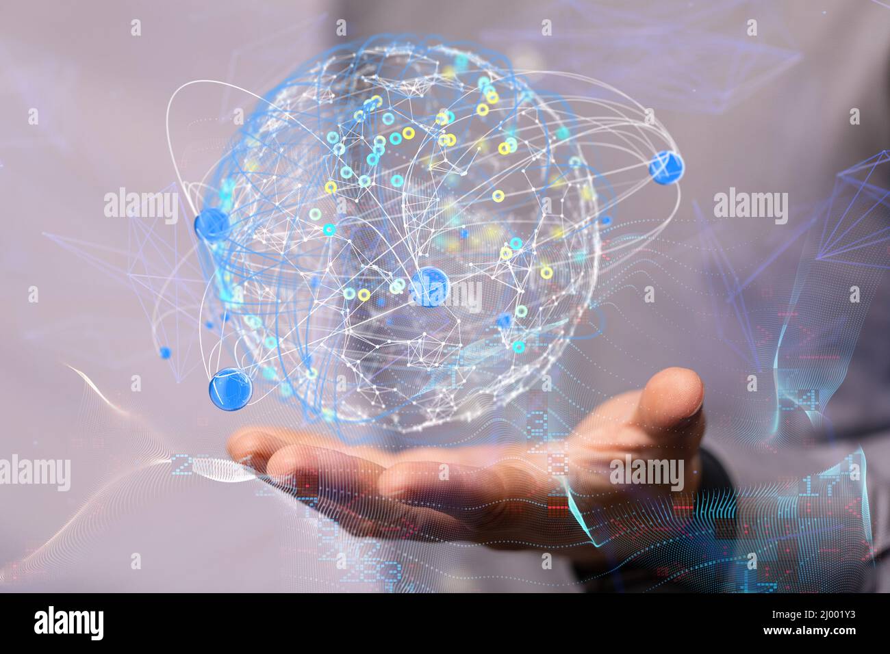 Businessman holding a floating render of a colorful global network ...