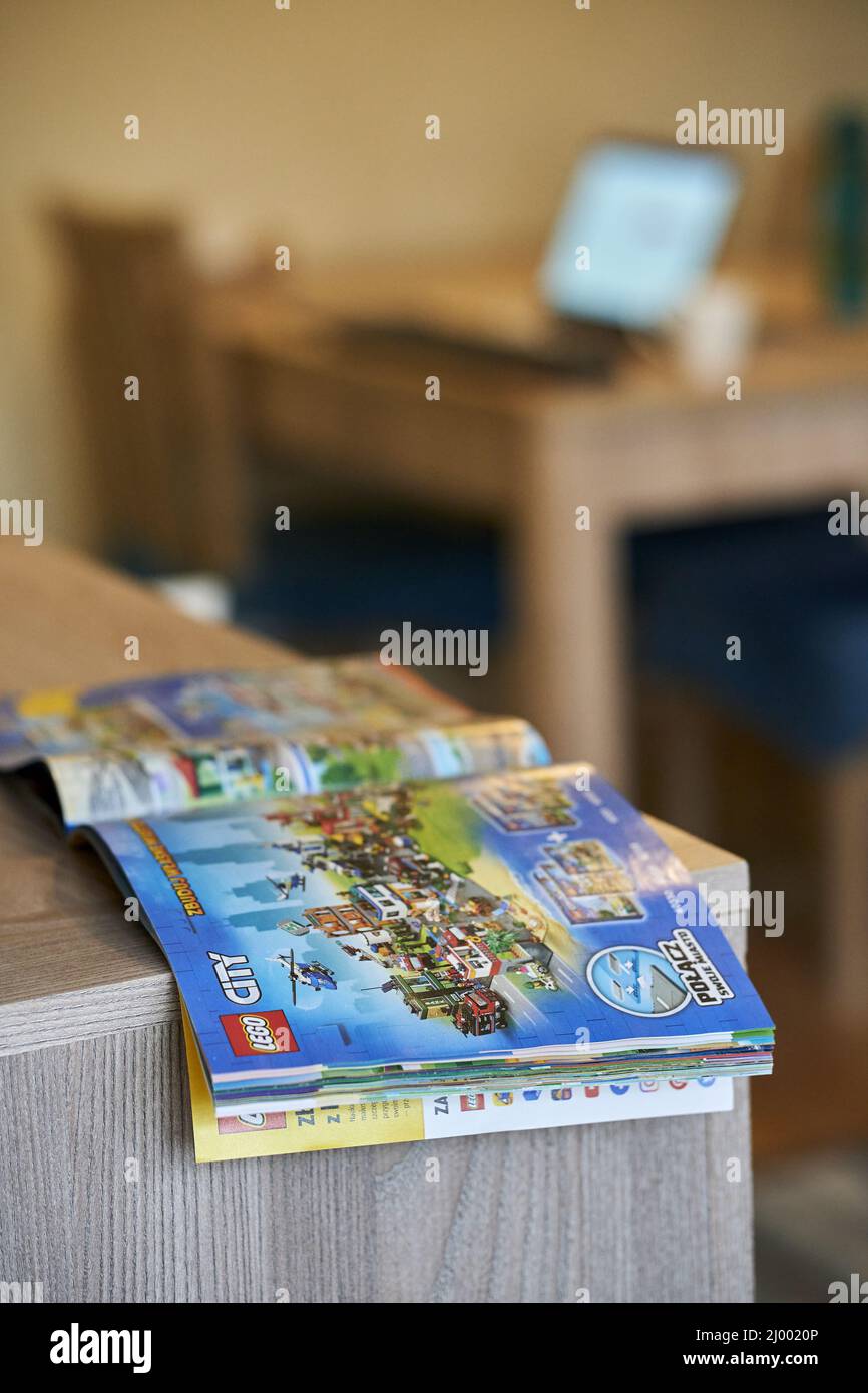 Open Lego City brochure on a table Stock Photo - Alamy