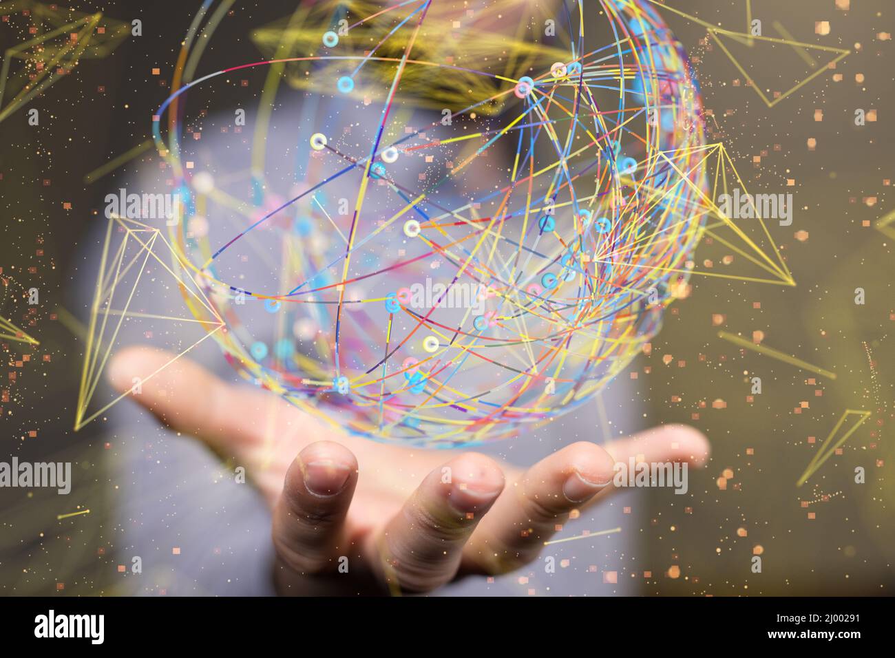 Businessman holding a floating render of a colorful global network ...
