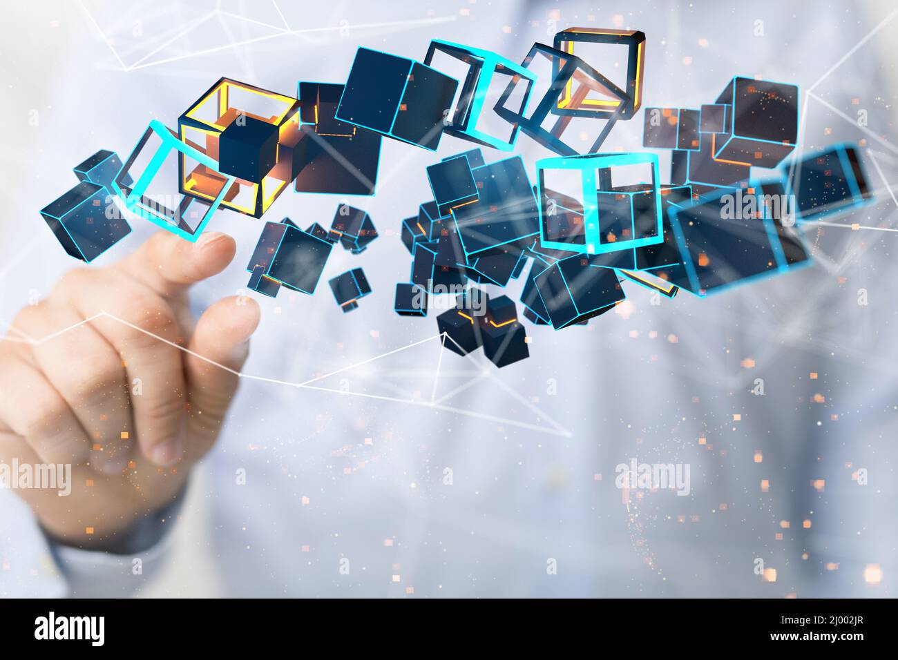 Businessman working on a floating render of digital connected cubes ...
