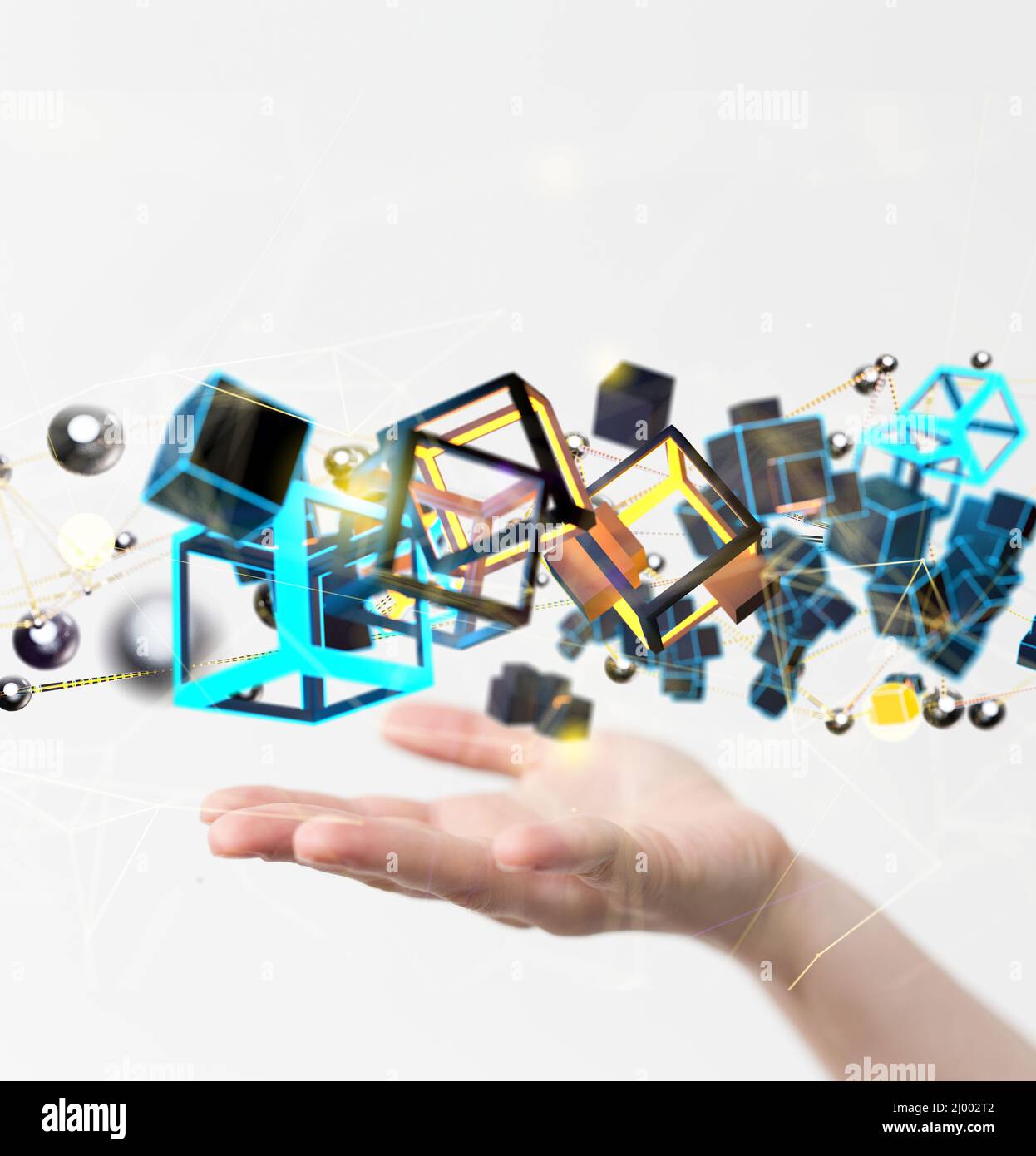 Businessman working on a floating render of digital connected cubes ...