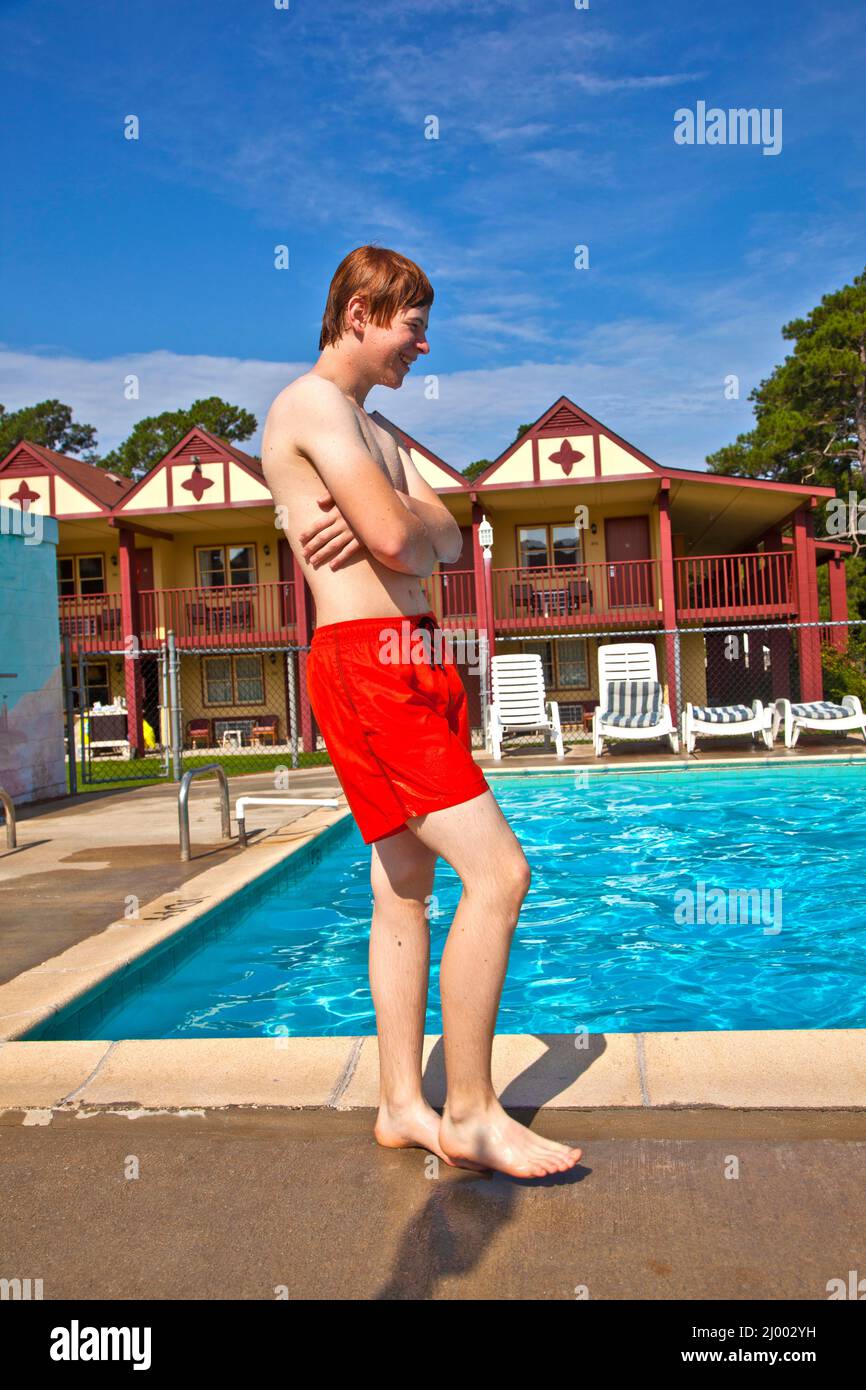 young boy has fun at the pool Stock Photo - Alamy