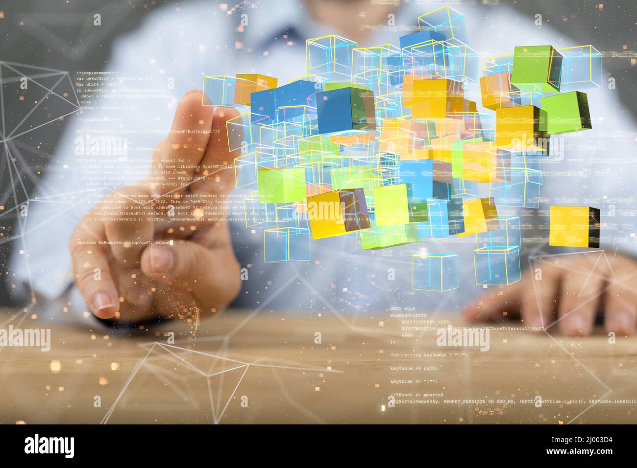 Businessman tapping on a digital render of a floating connected cube ... Businessman tapping on a digital render of a floating connected cube ...
