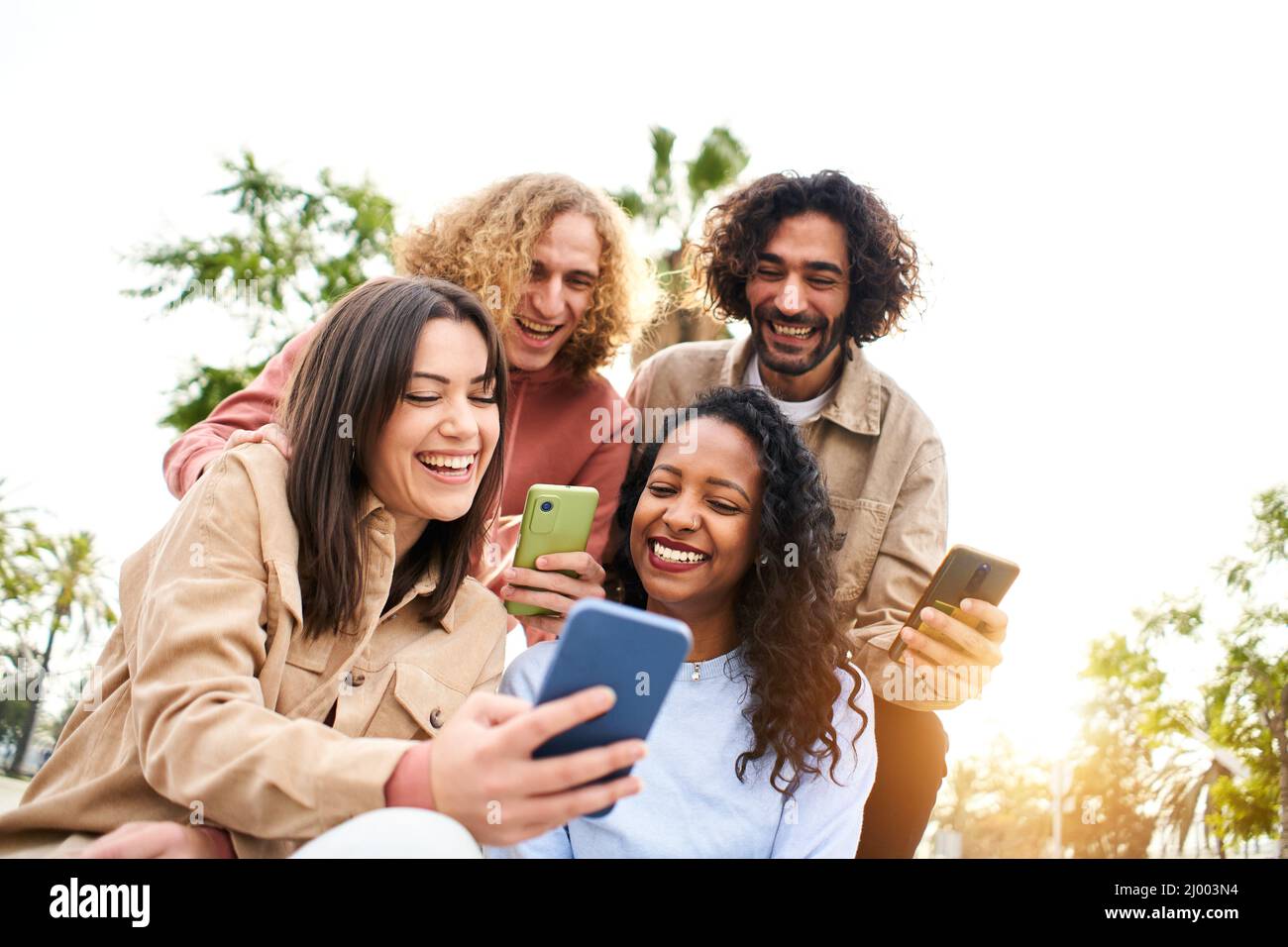 Watching the phone hi-res stock photography and images - Alamy