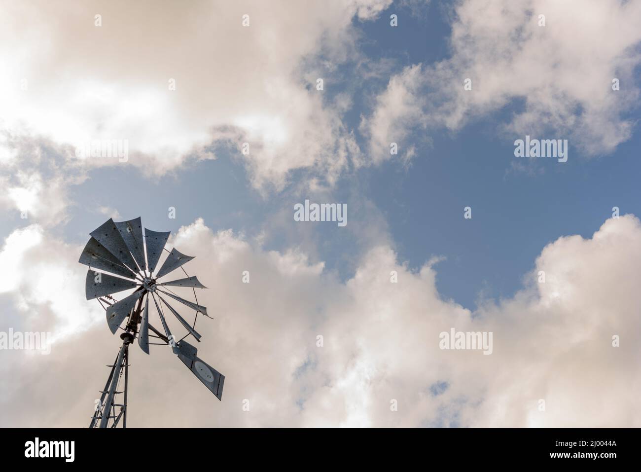 Old wind turbine in a garden that can produce energy. France Stock ...