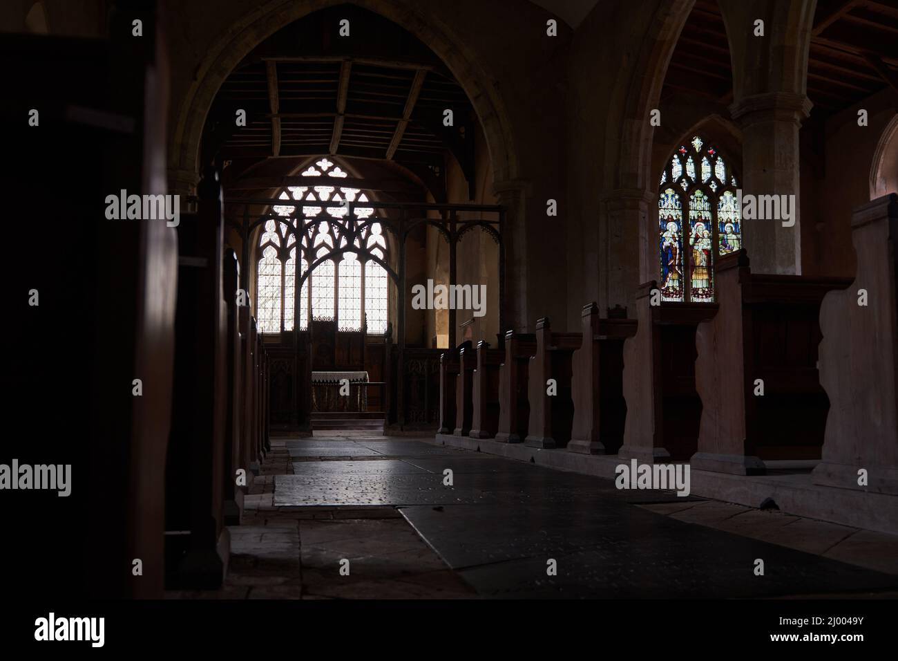 Corridor between seats in an old church Stock Photo - Alamy