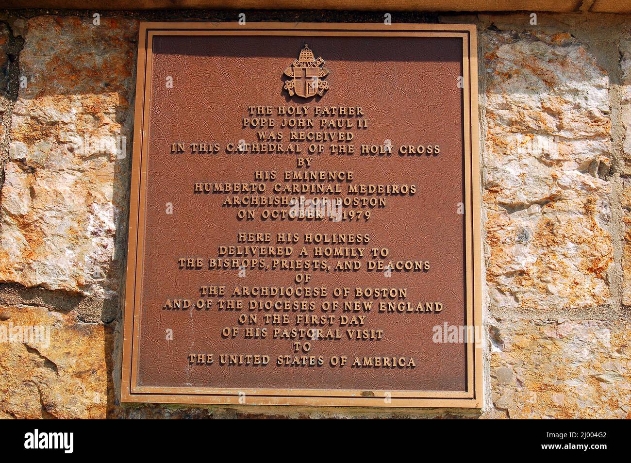 A plaque on Holy Cross Cathedral in Boston commemorates the visit of ...