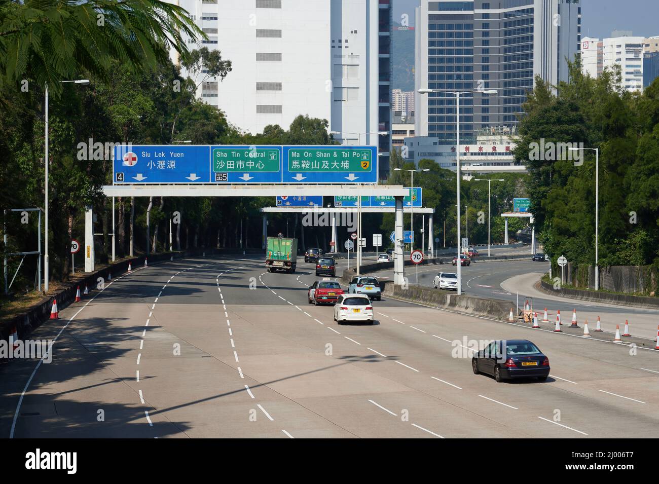 Traffic in Tate's Cairn Tunnel in Hong Kong at sunny day Stock Photo ...