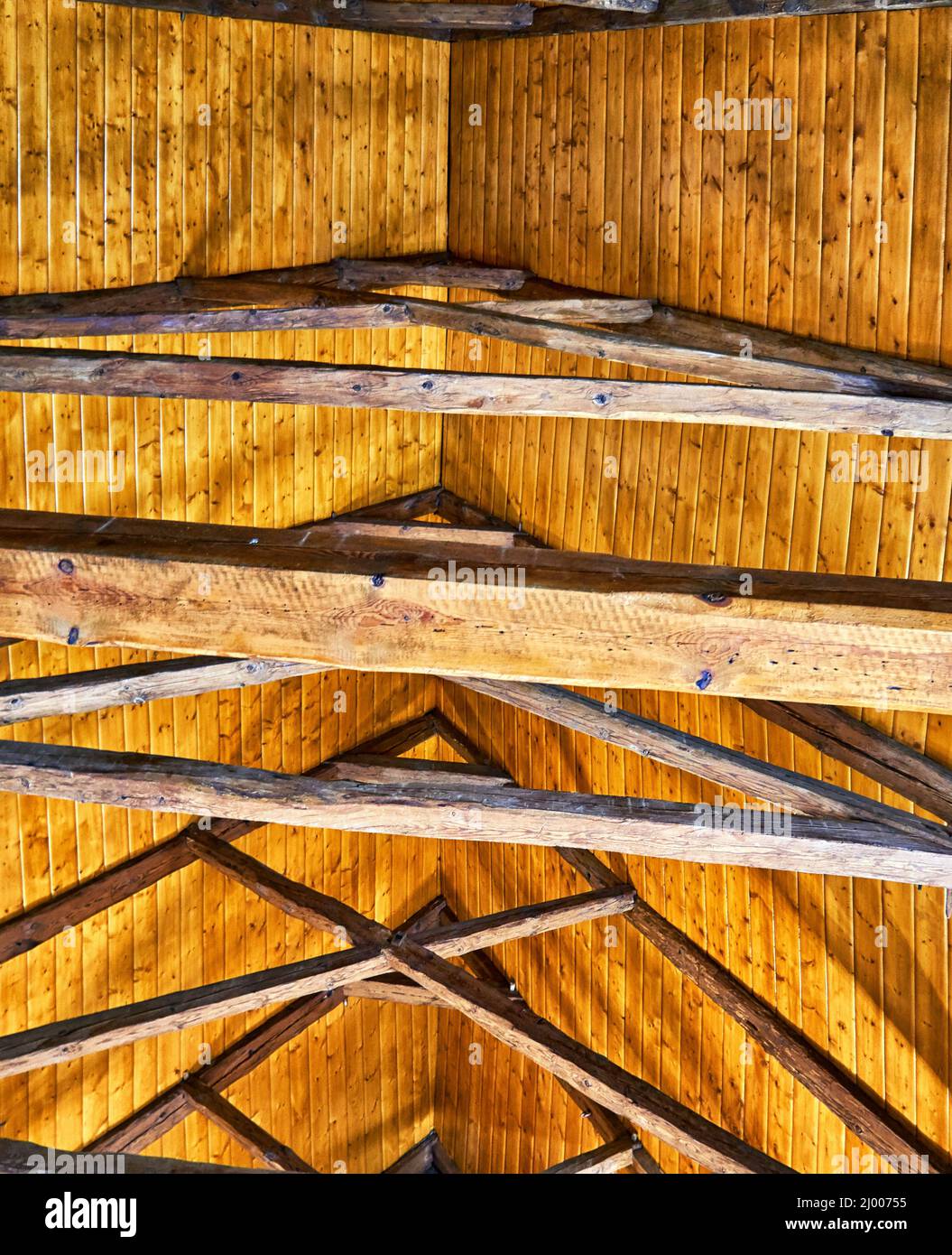 Roof truss made of old wooden beams as a background Stock Photo - Alamy