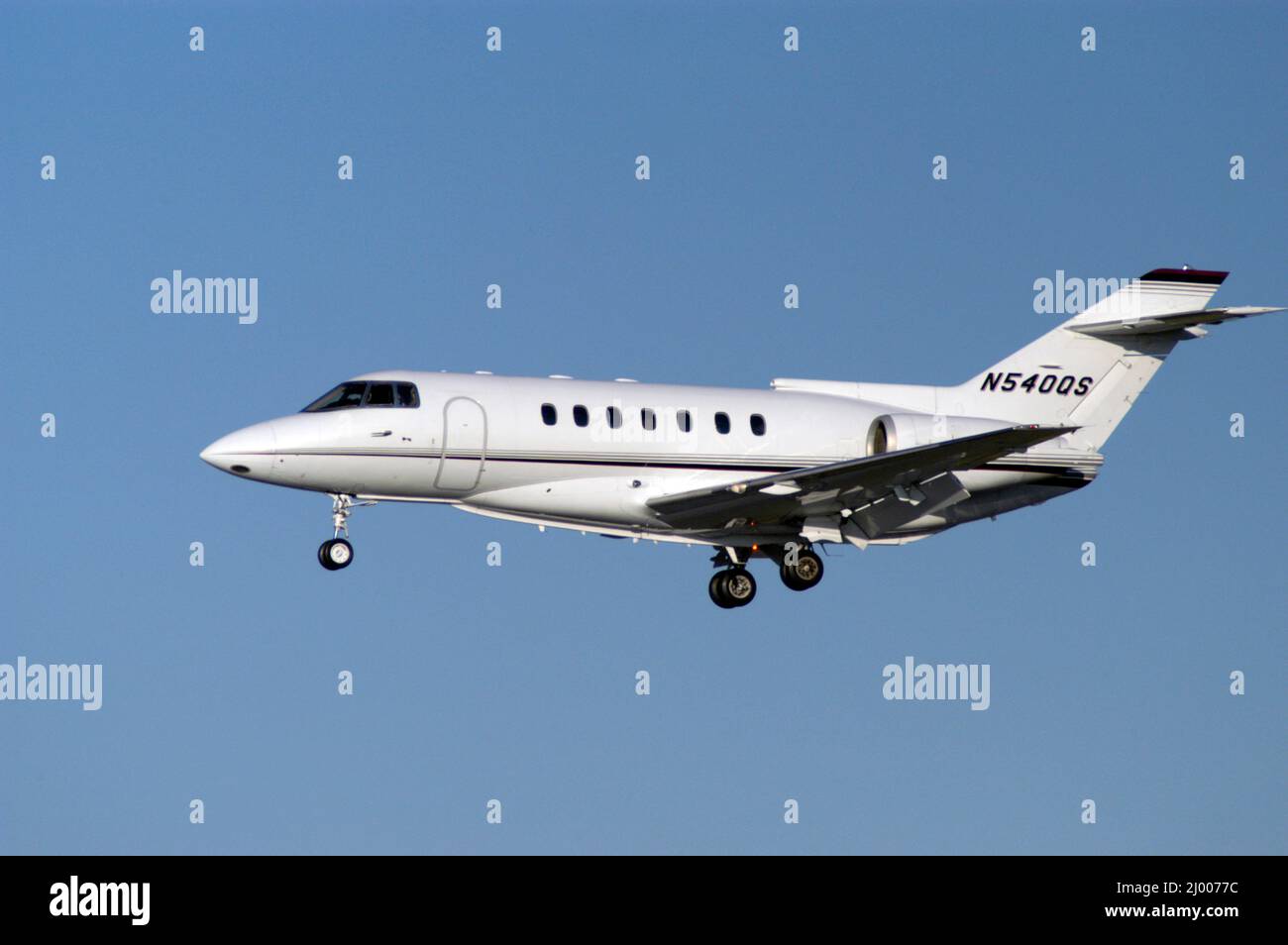Airplane in the air -- Falcon Jet (90 Stock Photo - Alamy