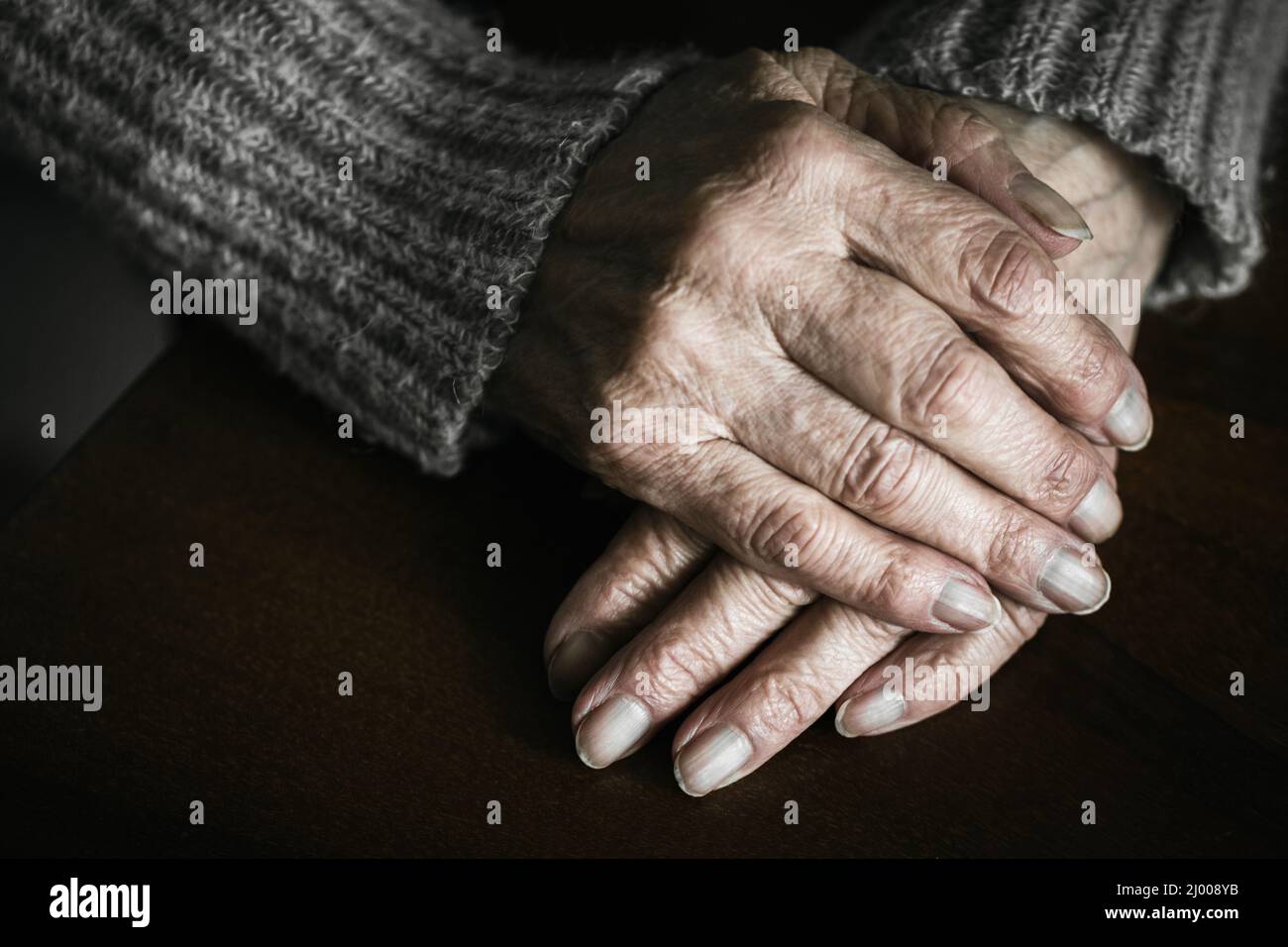 Old woman hand table hi-res stock photography and images - Alamy