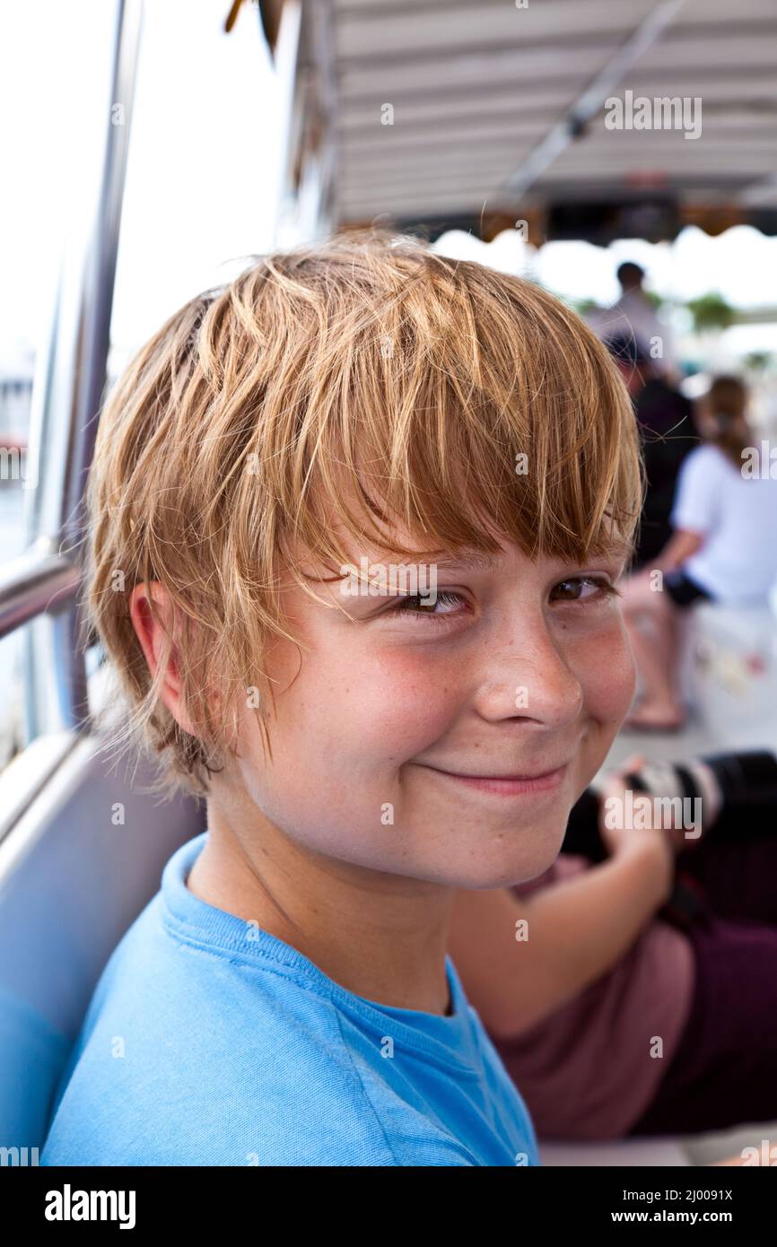 cute boy enjoys the boattrip Stock Photo - Alamy