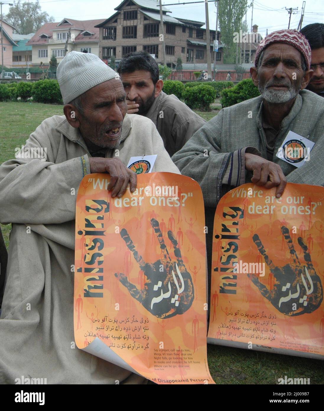 The fathers of "missing" Kashmiri youths attend a demonstration ...
