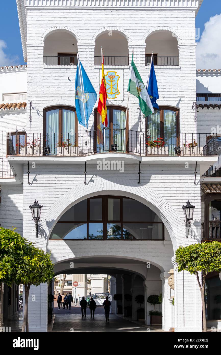 Townhall building of Nerja city. Spanish, European and Andalusian flag ...
