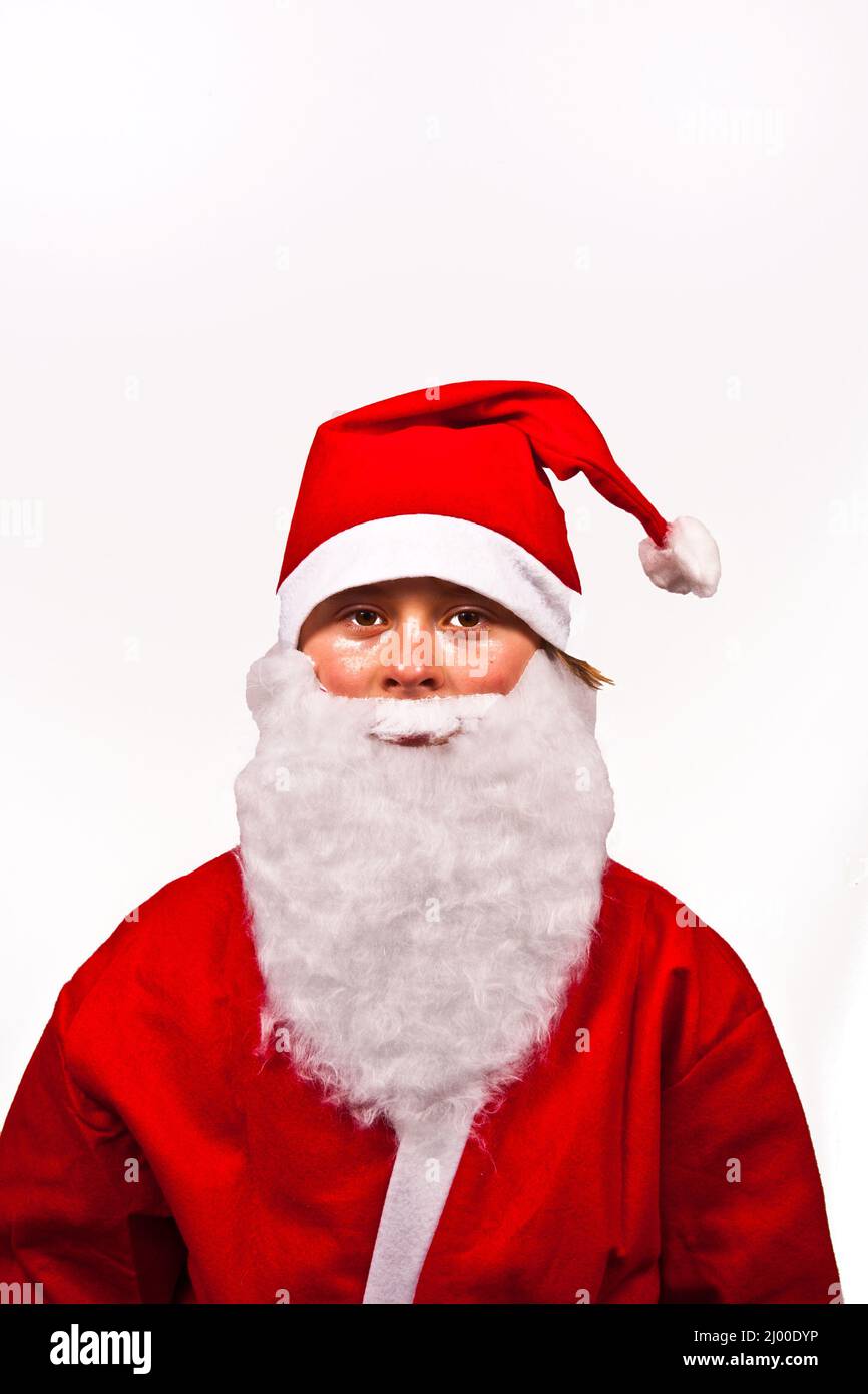 cute boy dressed as Santa Claus Stock Photo - Alamy