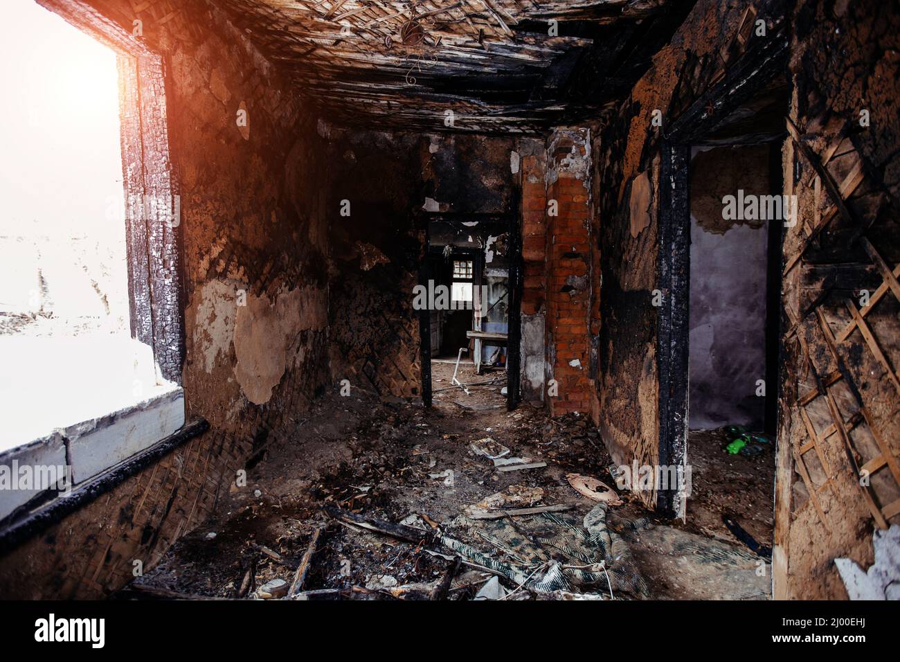 Burnt house interior. Consequences of fire or war Stock Photo - Alamy