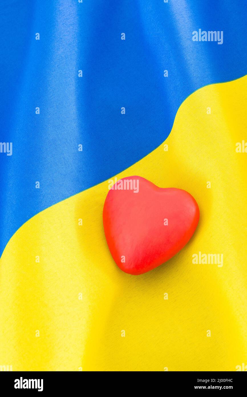 Blue and yellow Ukraine flag with heart shape. For support of Ukraine ...