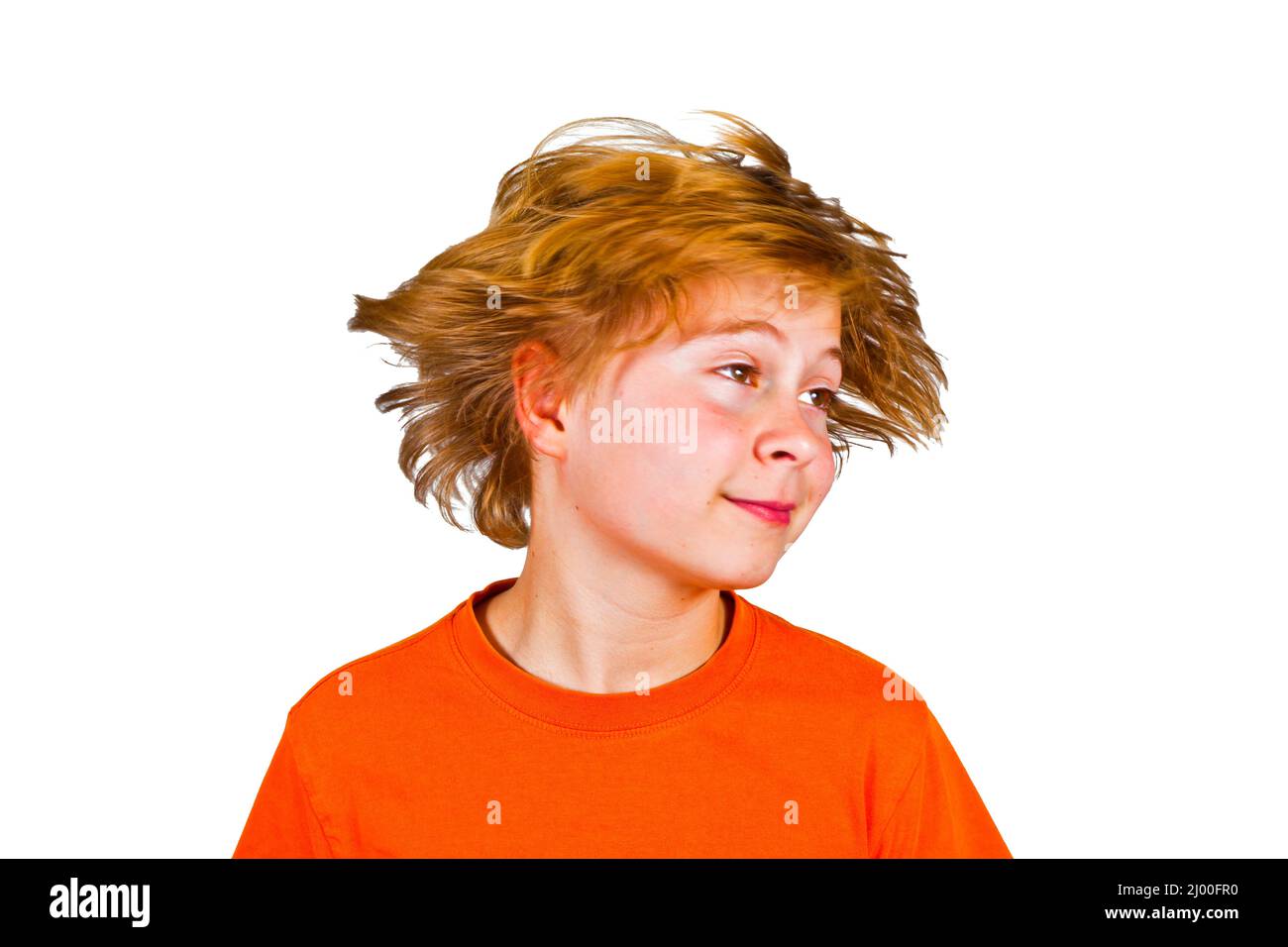 happy boy in Studio shaking his head isolated on white Stock Photo - Alamy