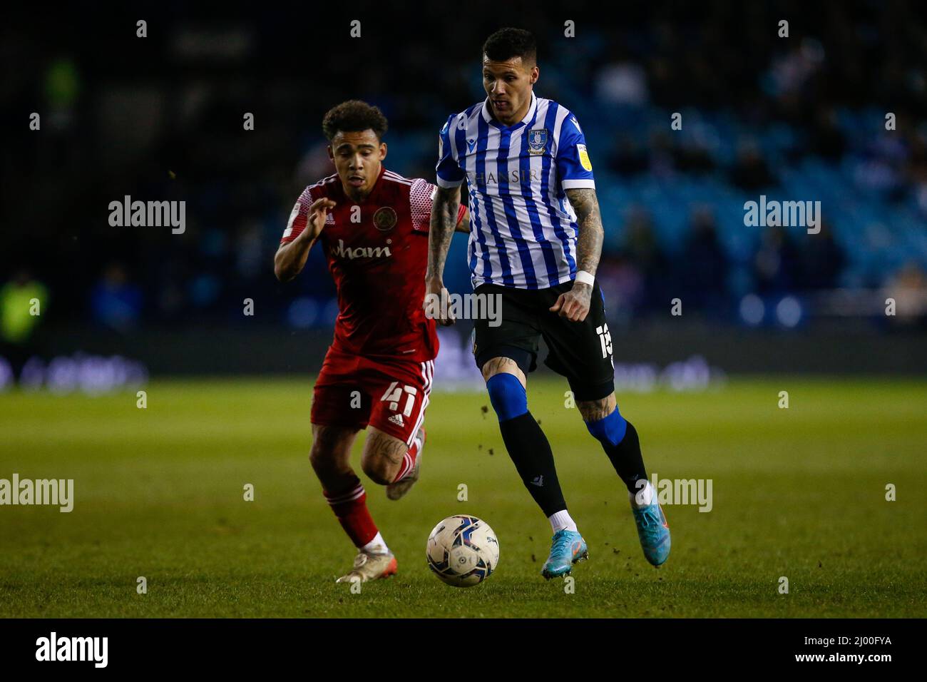 Marvin Johnson #18 of Sheffield Wednesday and Marcel Lewis #41 of ...