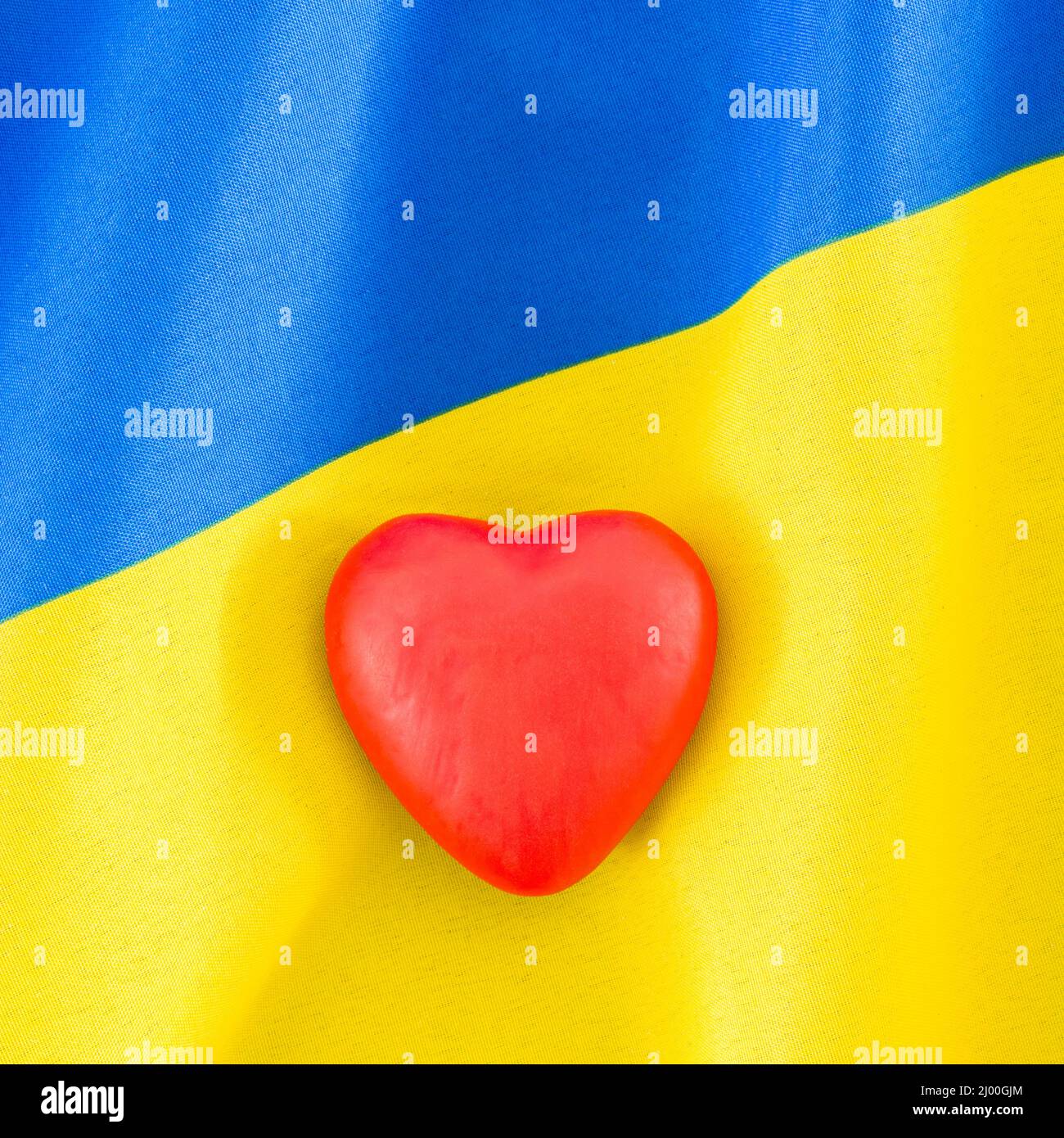 Blue and yellow Ukraine flag with heart shape. For support of Ukraine ...