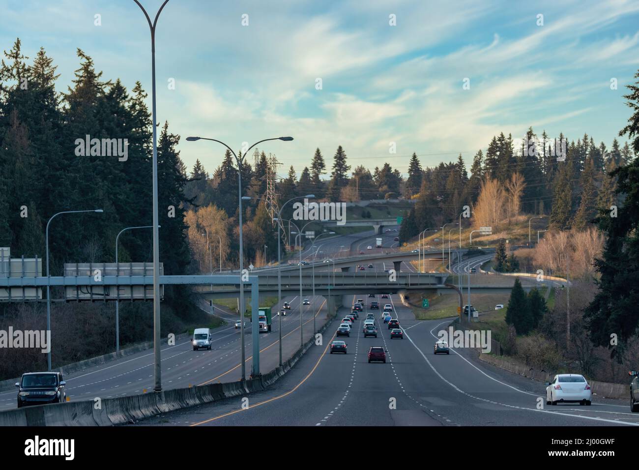 freeway interchanges and roadway show vehicles traveling Stock Photo ...