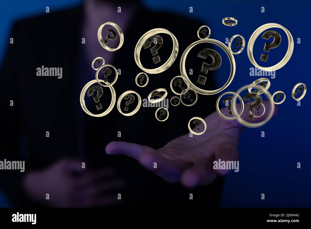 Man holding 3d rendered question marks in his hand Stock Photo - Alamy