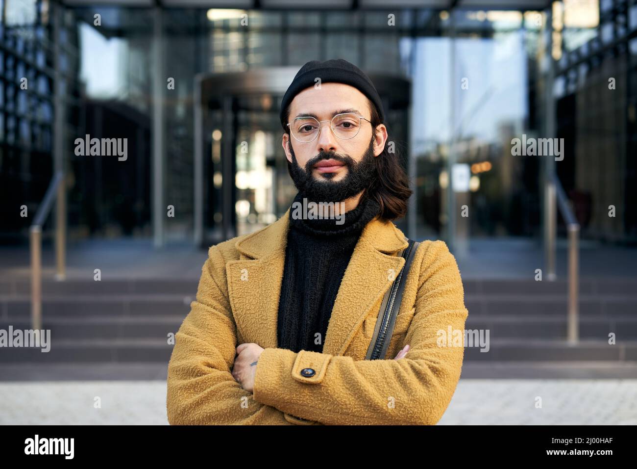 Portrait of young new workers facing serious at camera. Entrepreneur ...
