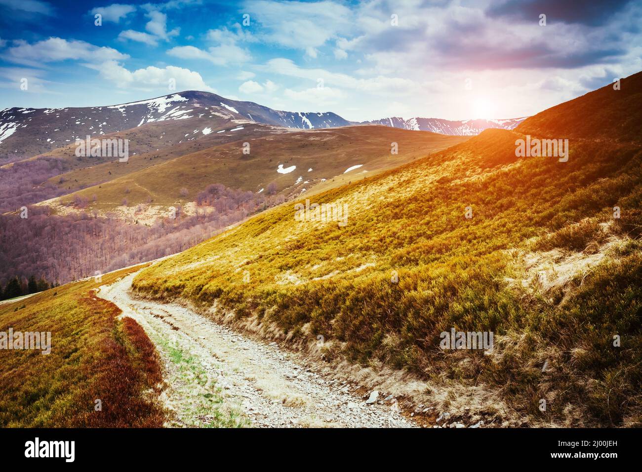 Gloomy view of the range under overcast sky. Dramatic scene and ...