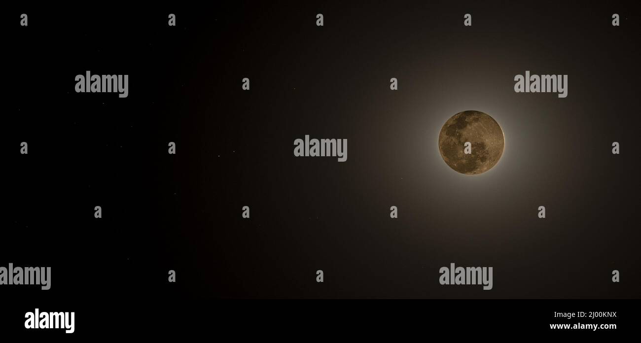 Beautiful view of red moon with haze in starry night Stock Photo - Alamy
