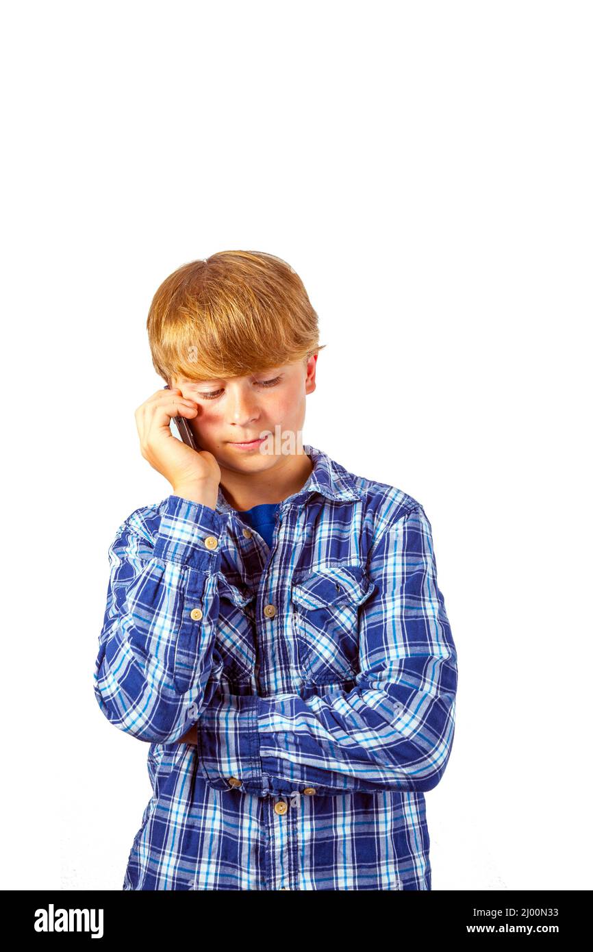 cute handsome young boy using his mobile phone Stock Photo - Alamy