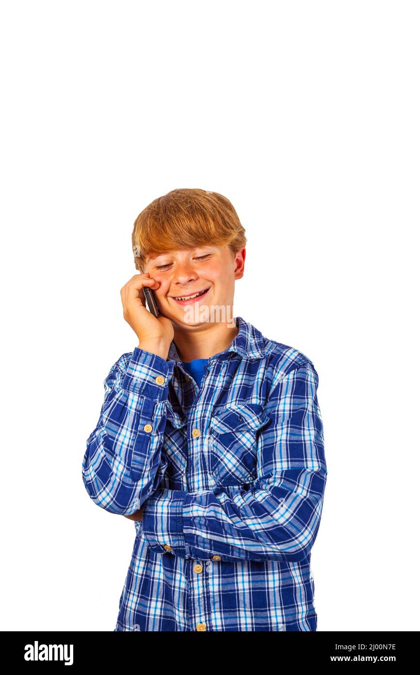 cute handsome young boy using his mobile phone Stock Photo - Alamy