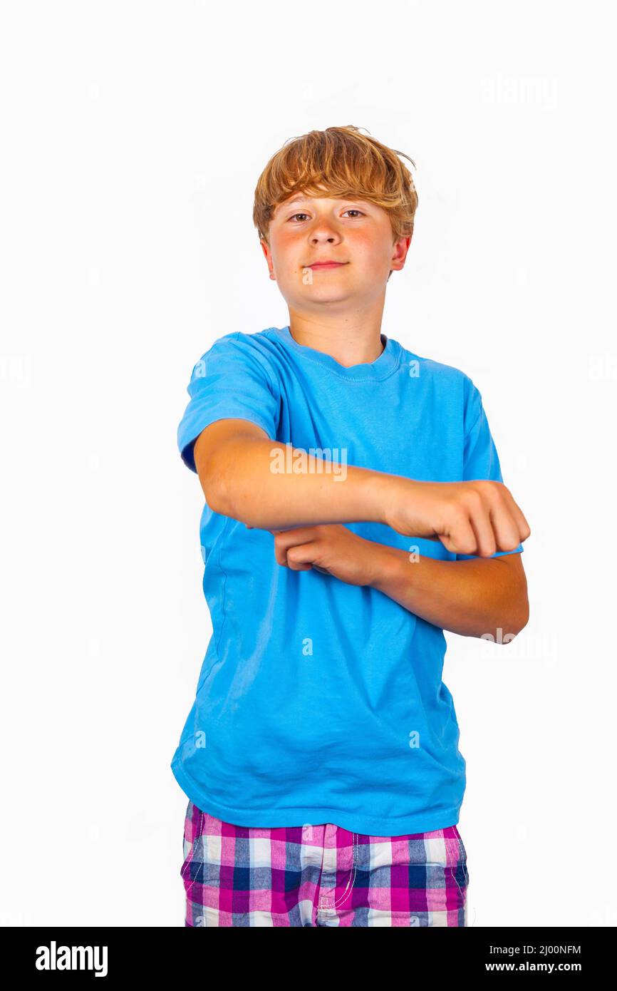 happy boy gestures with his arms with a white wall background Stock ...