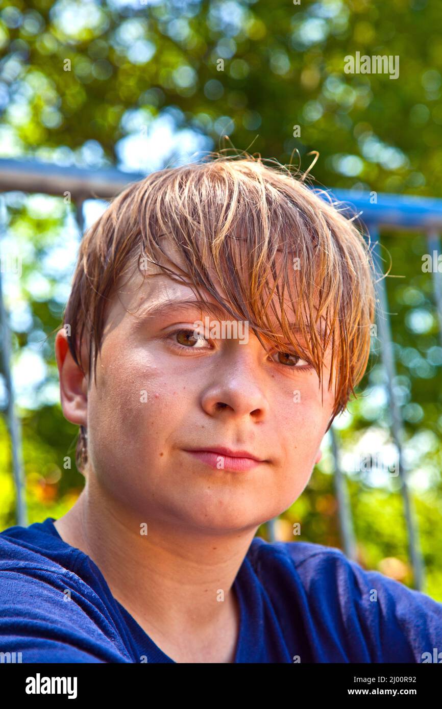 young boy sweating and exhausted from sports Stock Photo - Alamy
