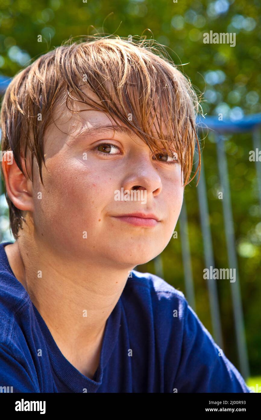 young boy sweating and exhausted from sports Stock Photo - Alamy