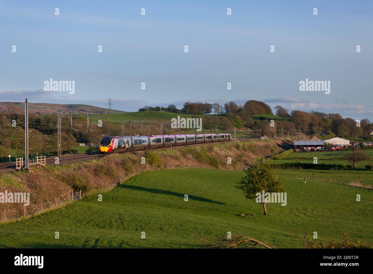 Virgin Trains Alstom class 390 electric Pendolino train passing the ...
