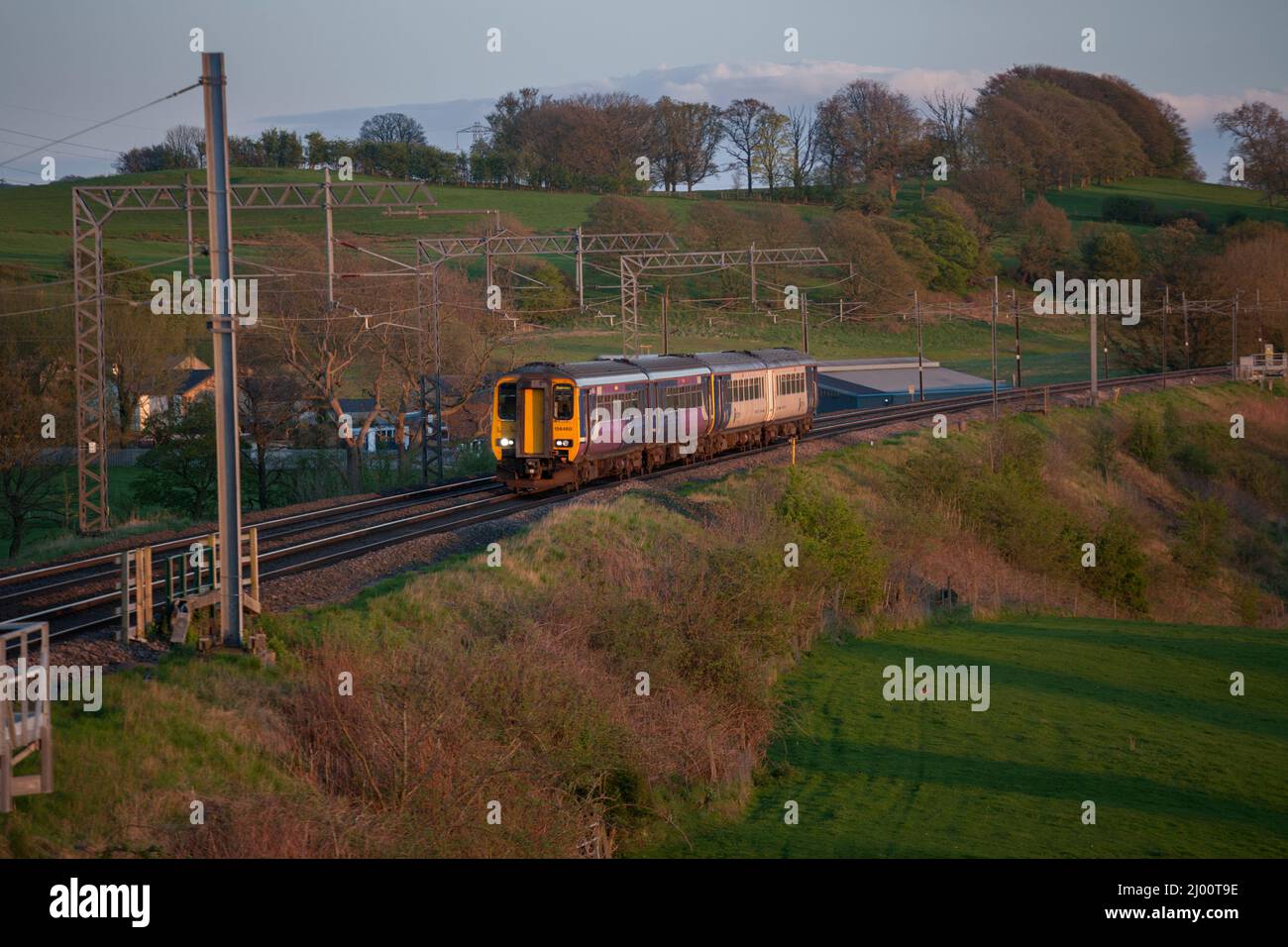 2 Northern Rail class 156 diesel sprinter trains 156460 + 156490 on the electrified west coast ...