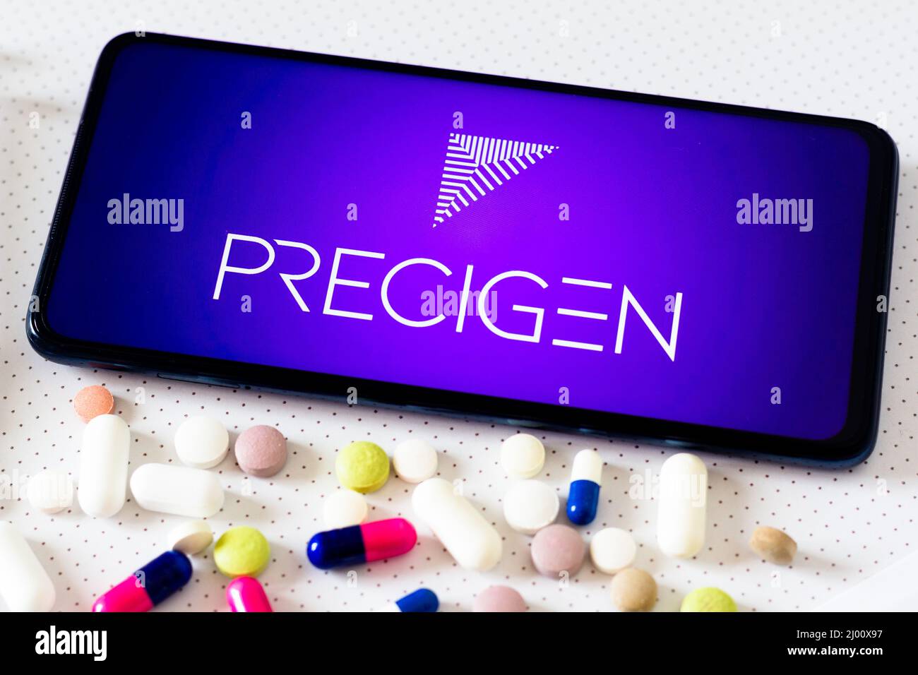 In this photo illustration the Precigen logo seen displayed on a ...
